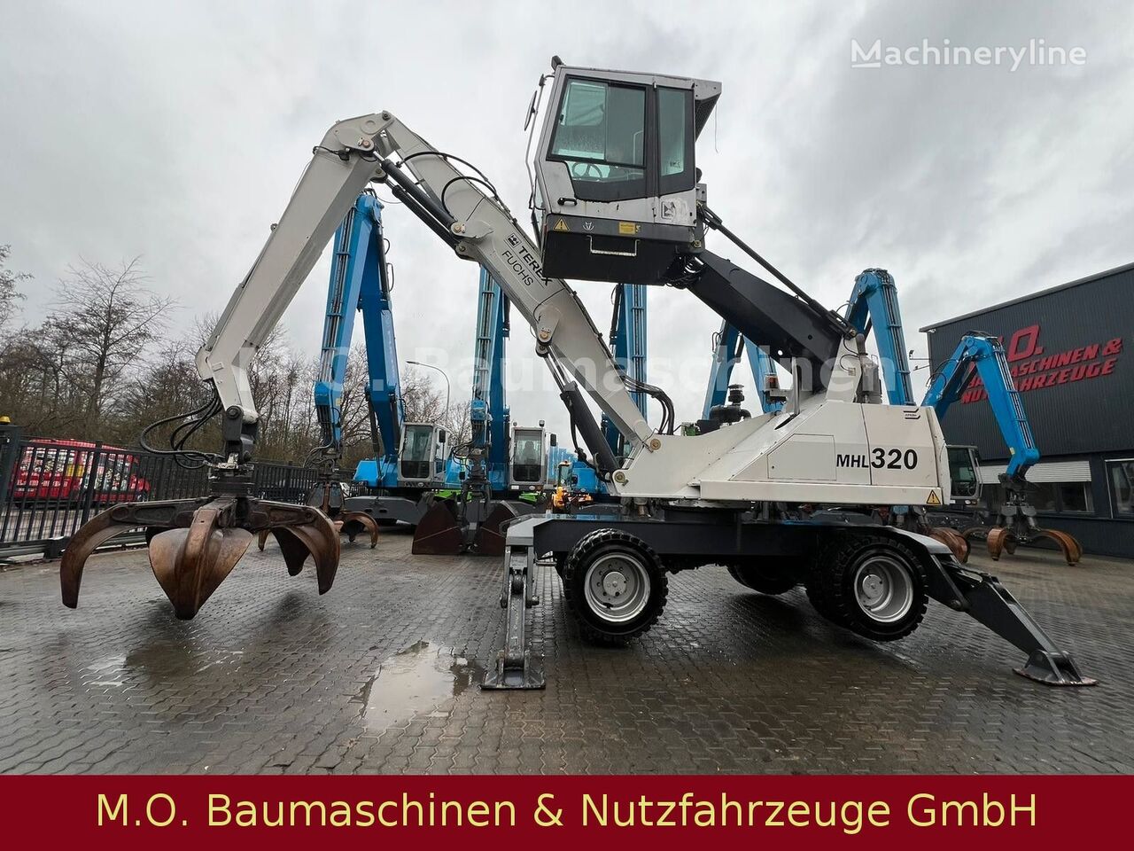 Fuchs Terex MHL 320 / Polyp/ Liftkabine/ material handler for sale ...